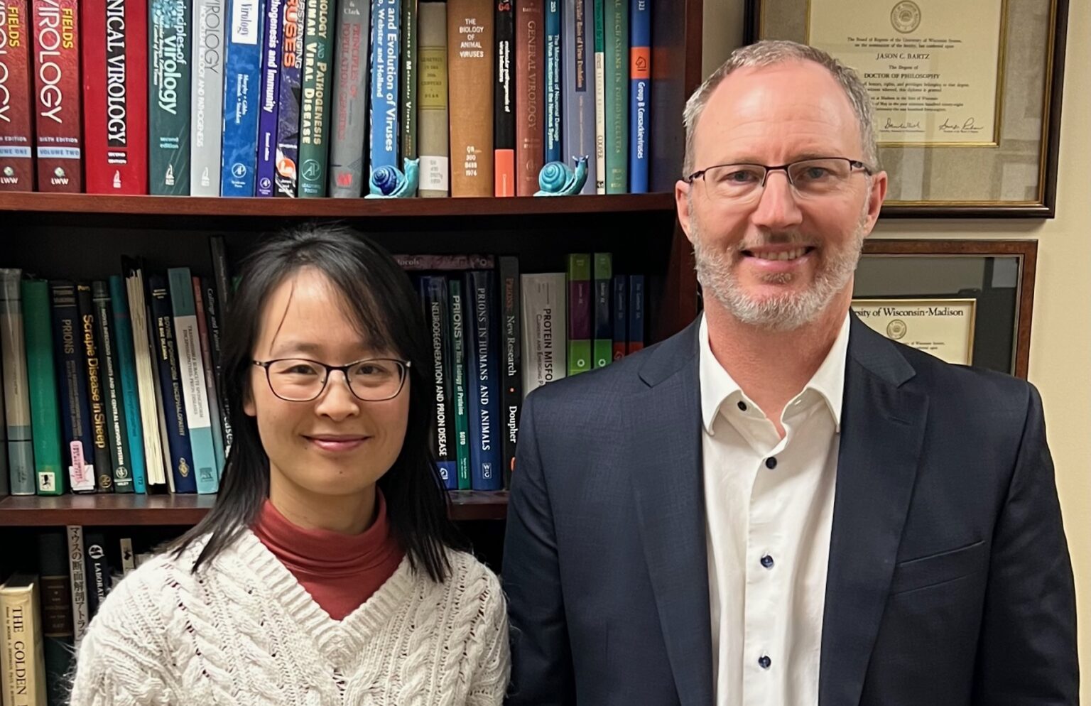 Jason C. Bartz, PhD and Qi Yuan, PhD - CJD Foundation